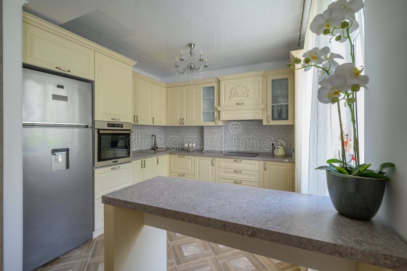 Interior of Modern Trendy Cream Colored Kitchen Stock Image - Image of ...