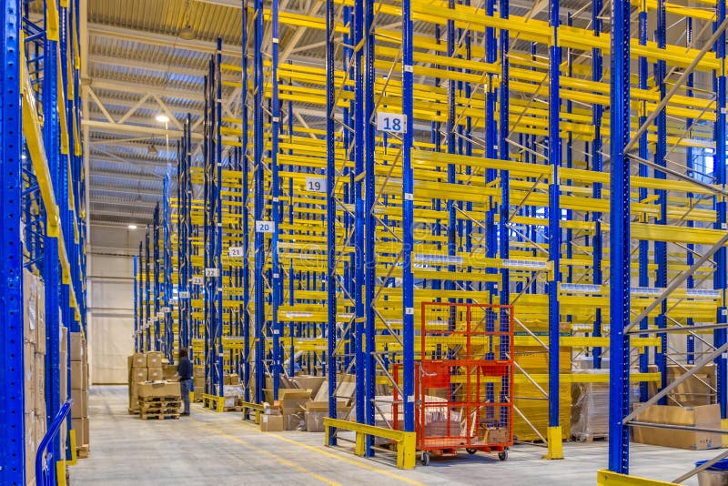 Interior of a Modern Warehouse Storage with Empty Rows and High Blue ...
