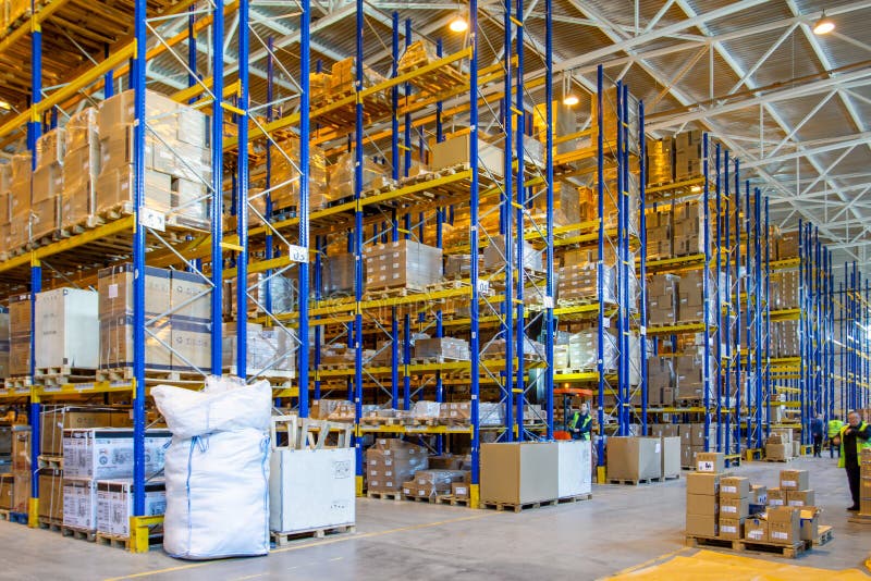 Interior of a Modern Warehouse Storage with Rows and Goods Boxes on ...