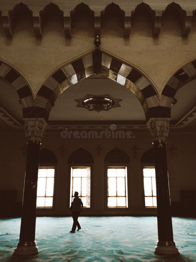 Interior of the Mosque with Arched Columns and Colorful Carpet Stock ...