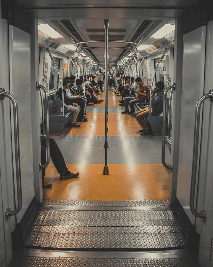 Mumbai Metro Train Running and Commuters Sitting & Standing in the ...