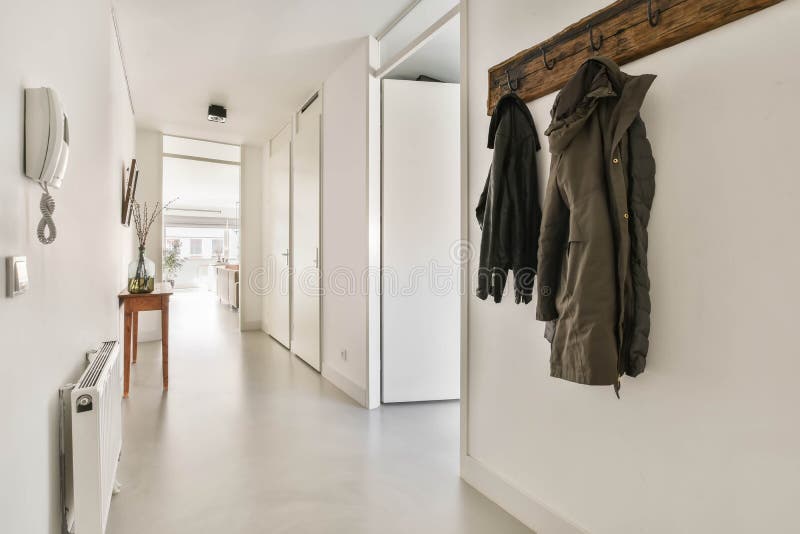 The Interior of a Narrow Corridor with a Cozy Design Stock Image ...