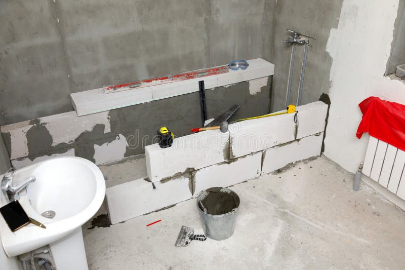 Interior of a New Bathroom with the Concrete Blocks and Construction ...