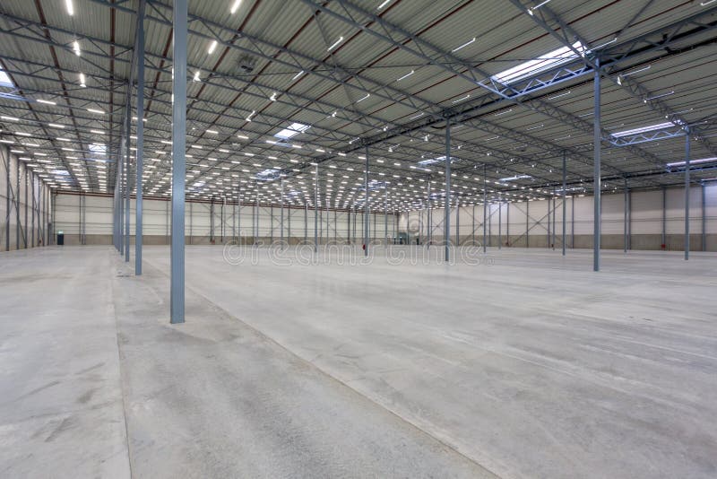 Interior of a New Empty Warehouse Stock Photo - Image of construction ...