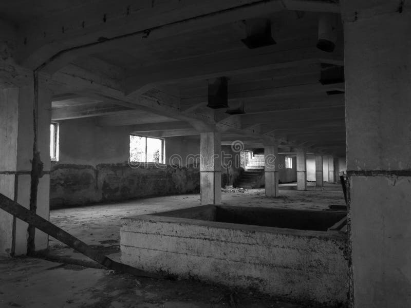 Interior of an Old Abandoned Concrete Hall. Empty Messy Industrial ...