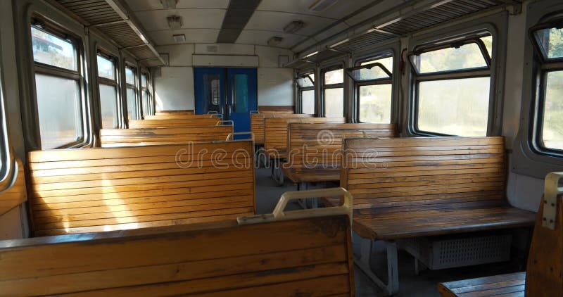 Wooden Seats in an Empty Coach of Suburban Train, Interior of Old Empty Wagon Stock Footage ...