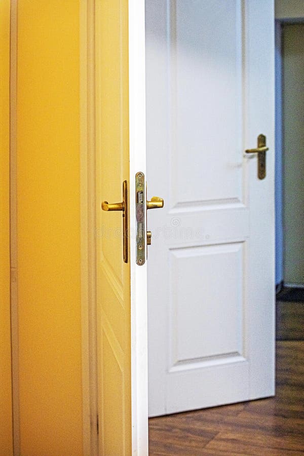 Interior Opening White Doors with Locks in a Light Stock Photo - Image ...