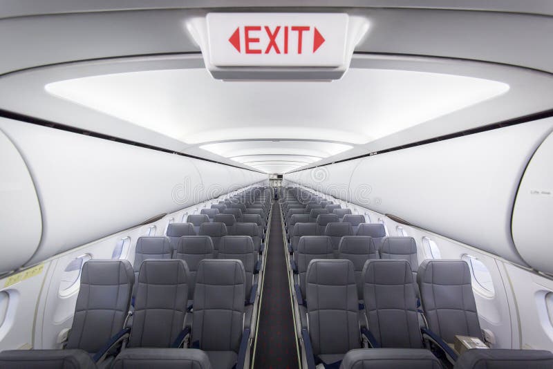 Interior of Passenger Airplane with Exit Sign Stock Image - Image of ...
