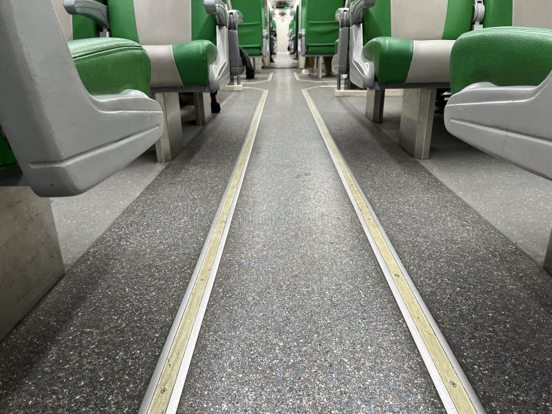 Interior of a Passenger Train Car Featuring Rows of Seats Stock Photo ...