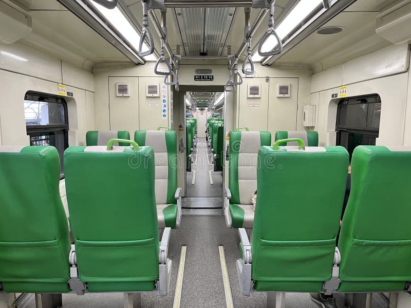 Interior of a Passenger Train Car Featuring Rows of Seats Stock Photo ...