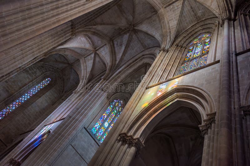Interior Perspective of Columns of Monastery with Colored Windows and ...