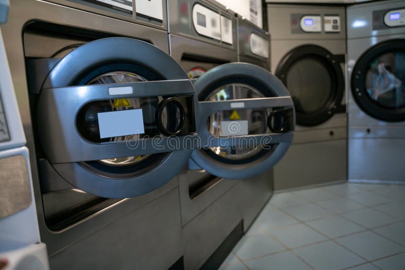 Shared Laundry Room with Several Front-loading Washing Machines Stock ...