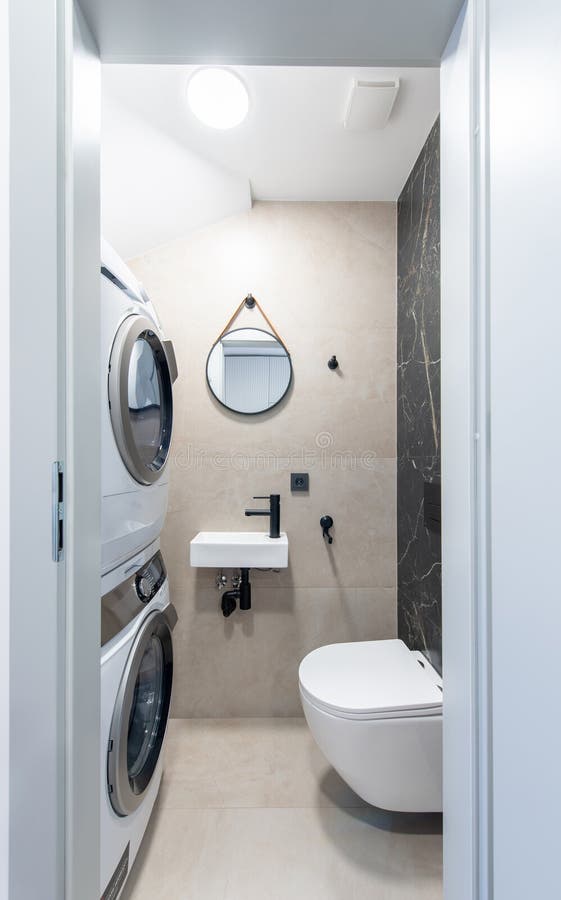 Interior of a Real Laundry Room with a Washing Machine at Home. a ...