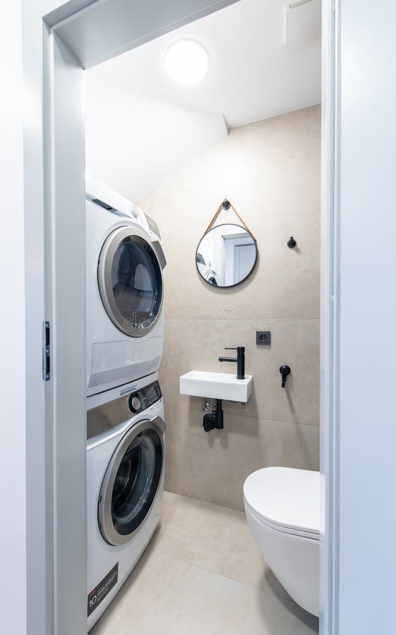 Interior of a Real Laundry Room with a Washing Machine at Home. a ...