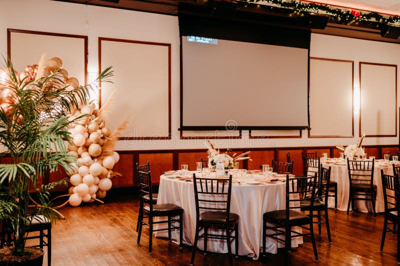 Interior of a Restaurant with Simple Black Chairs and White Round ...