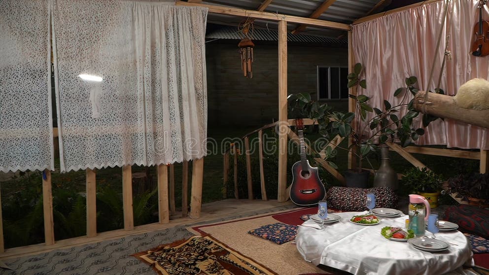 Interior of a Rustic Cottage with a Guitar on the Table Stock Photo ...