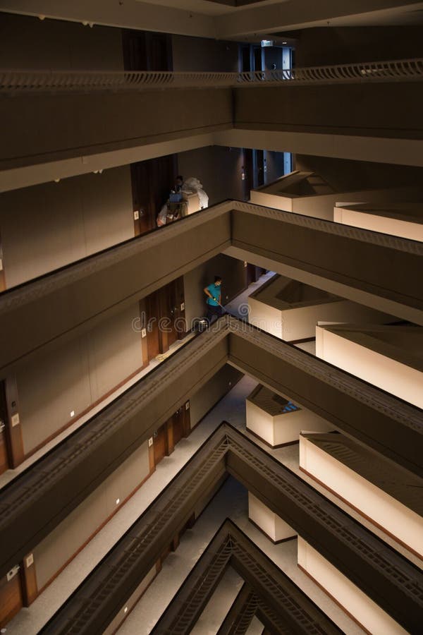 An Open Book Shelf Inside a Large Building, with Shelves Editorial ...