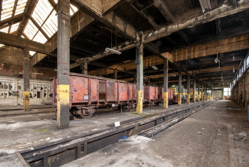 Interior Shot of an Old Warehouse with Old Trains Stored Inside Stock ...