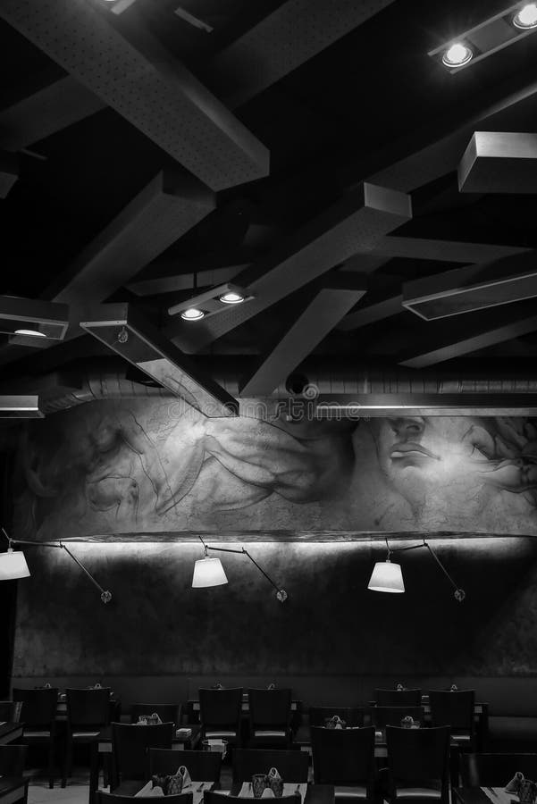 Interior Shot of a Restaurant Features Tables and Chairs with Bright ...