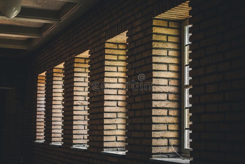 Sunlight through Narrow Brick Windows in Abandoned Building Stock Photo ...
