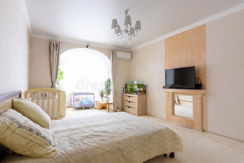 Interior of a Spacious Bedroom with Furniture and a Nice Light Design ...