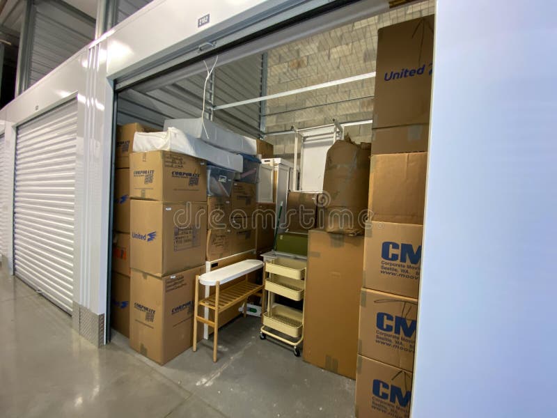 An Interior of a Storage Space Unit Displaying the Boxes at Extra Space ...