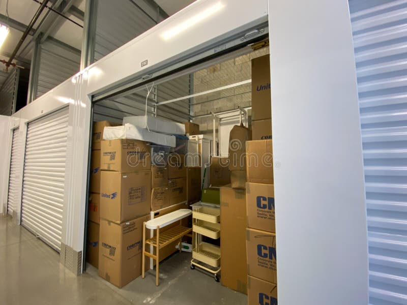 An Interior of a Storage Space Unit Displaying the Boxes at Extra Space ...