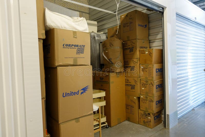 An Interior of a Storage Space Unit Displaying the Boxes at Extra Space ...