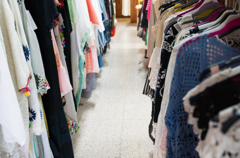 Interior in Summer Clothing Store Stock Image - Image of retail, hanger ...