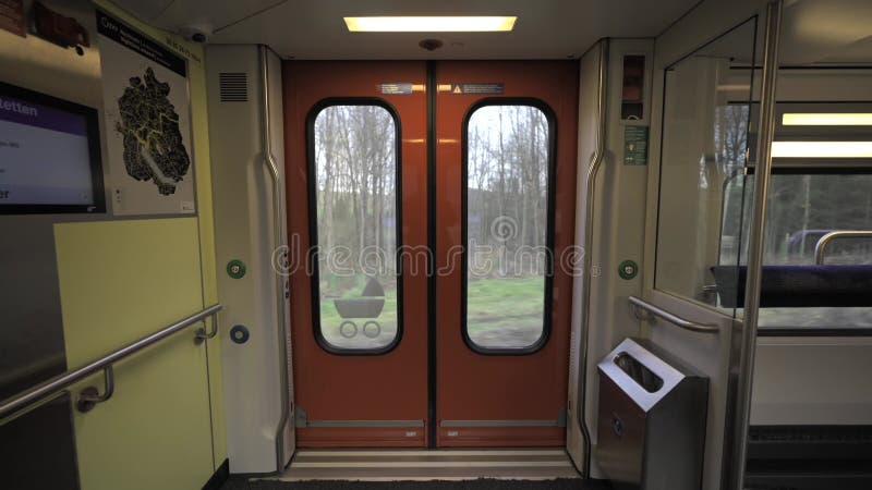Interior of Swiss Double-decker Train Showing Orange Automatic Doors ...