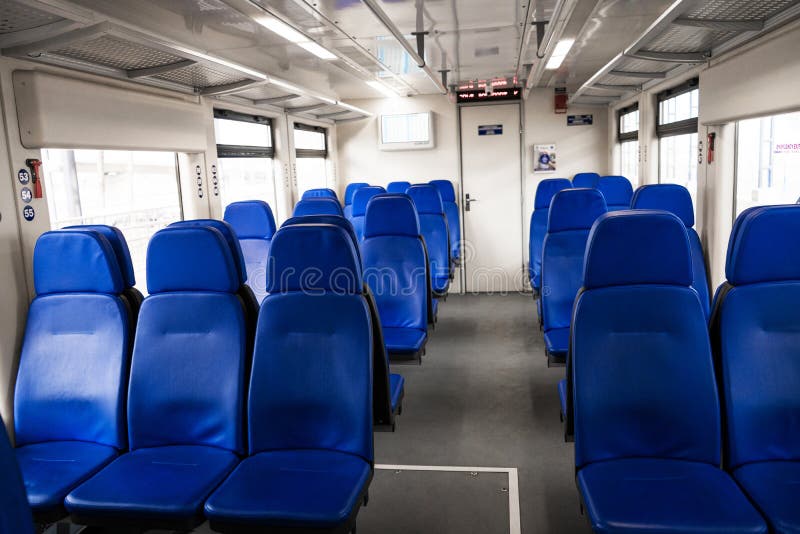 The Interior of the Transfer Train To the Airport. Rows of Blue ...