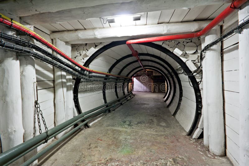 Interior of Underground Mine Passage with Rails, Light and Carriage ...