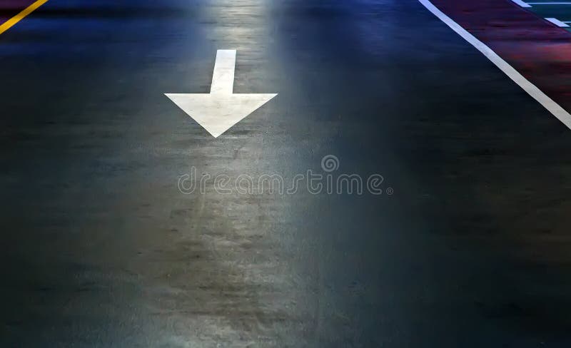 Interior Underground Garage or Parking Arrow Sign on the Road Stock ...