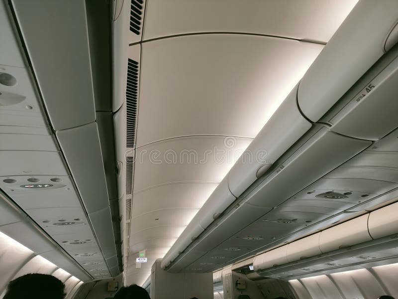 Cabin Compartment of an Airplane Stock Photo - Image of daylight ...