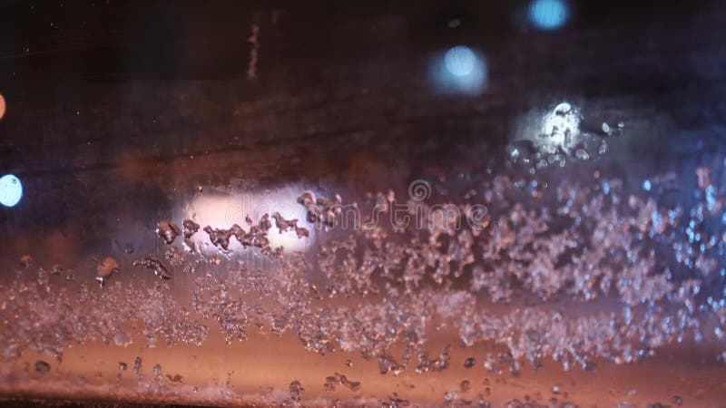 Interior View of a Car Windshield with Sleet Falling on the Window ...