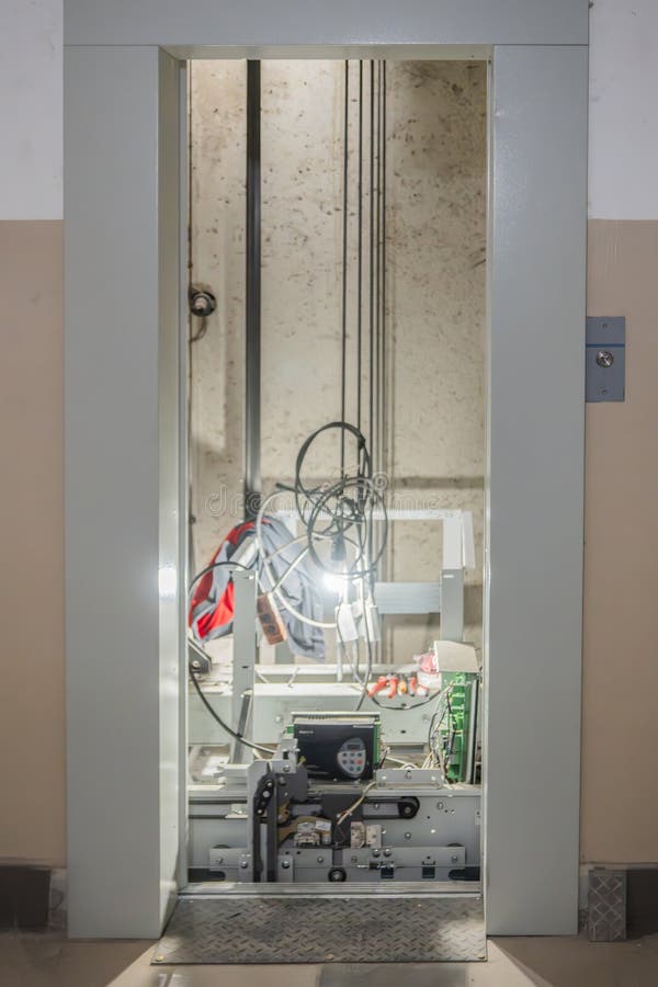 Elevator Doors Open in Case of Breakdown, Vertical Photo. Elevator Repair and Maintenance ...