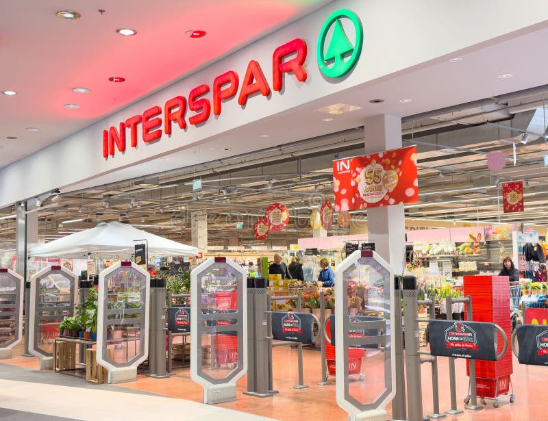 Interior View of Interspar Supermarket Entrance with Decor and Checkout ...