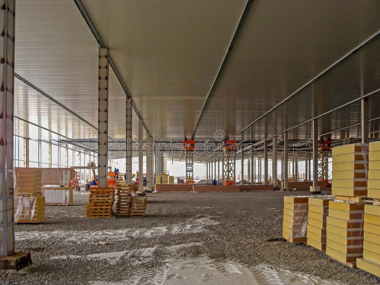 Interior View of a Large Building Under Construction, with the Roof and ...