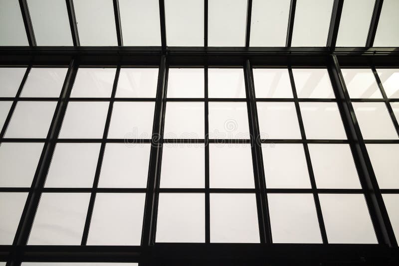 Looking Up View at Large Window Paneled Ceiling and Wall from Inside ...