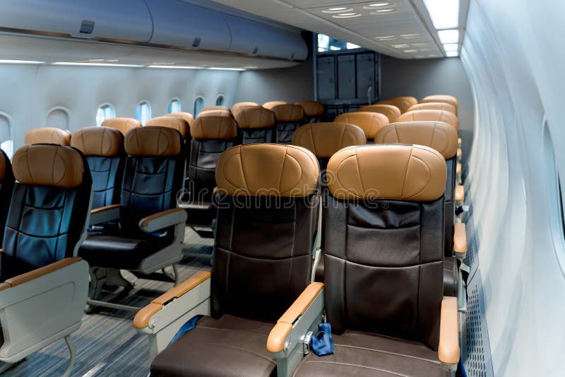 Interior View of Modern Commercial Airplane Cabin with Rows of Empty ...