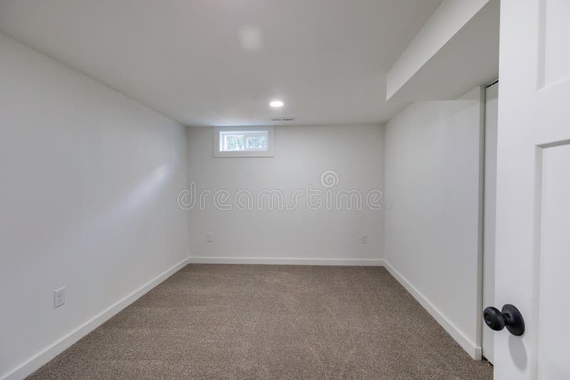 Interior View of a Renovated Empty Room, with Carpet Flooring and Small ...