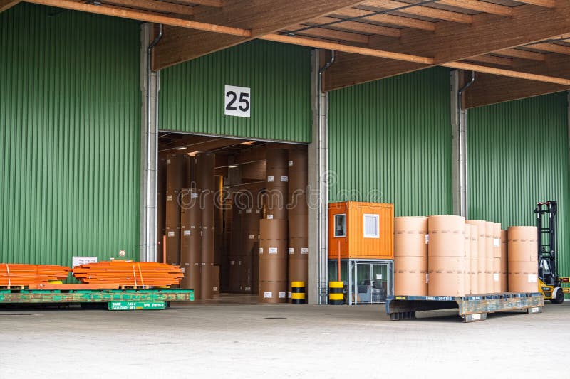 Warehouse Interior with Goods, Forklift, and Loading Dock Area ...