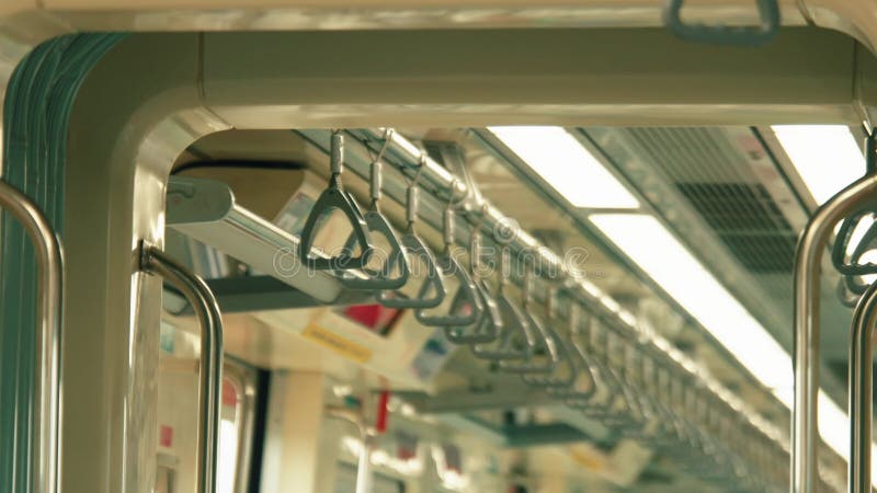 Interior of a Subway Train with Hanging Straps Stock Video - Video of ...