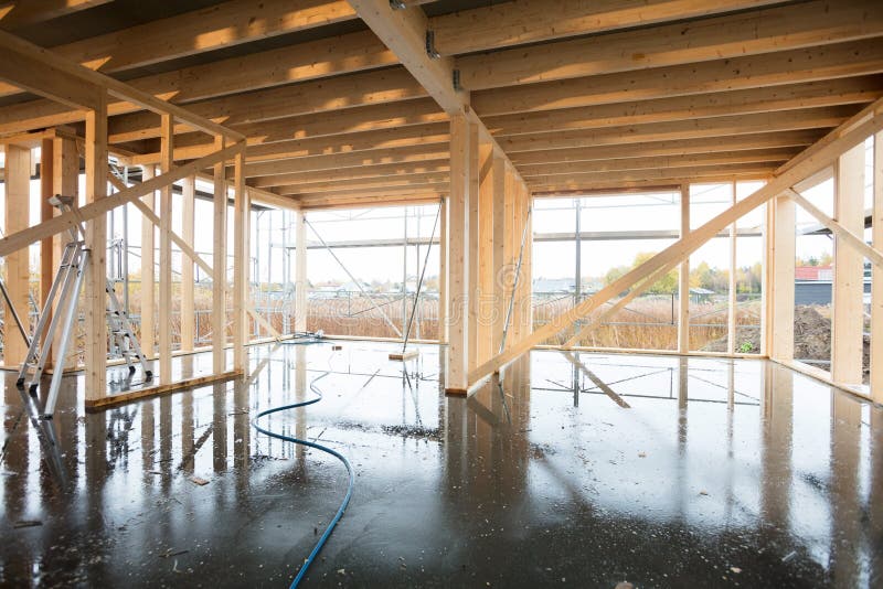Wooden Incomplete Building with Wet Flooring Stock Photo - Image of ...