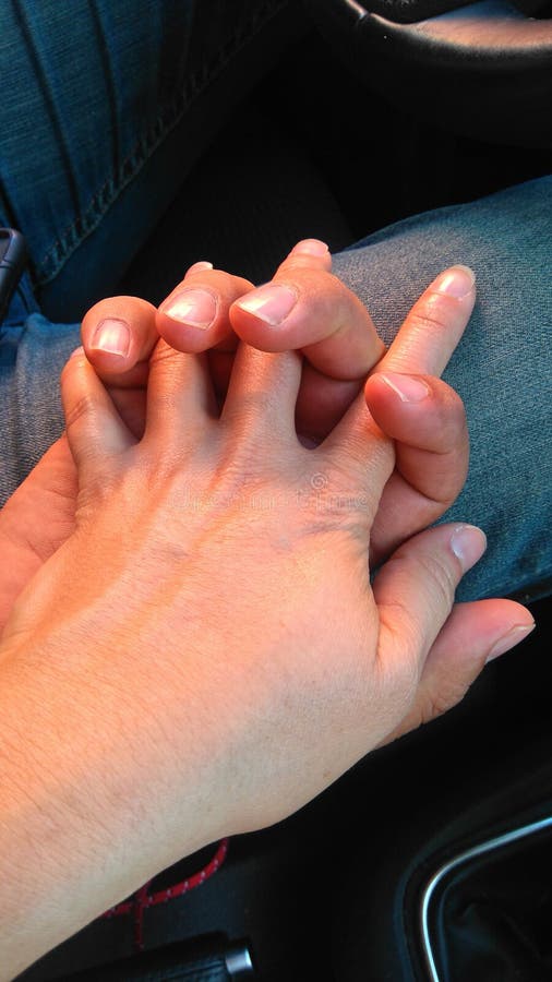 An Interlaced Pair of Hands Stock Image - Image of love, fingers: 140996695