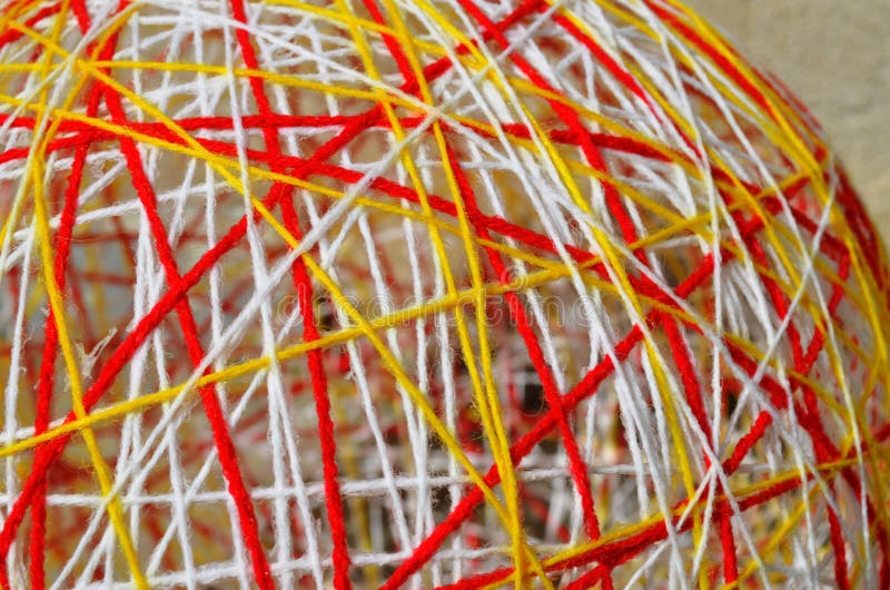 Interlacing Red White and Yellow Threads between Each Other Stock Image ...
