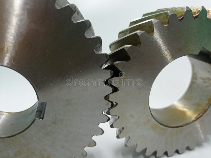 Interlocked Gears Lock Each Other on a White Background Stock Image ...
