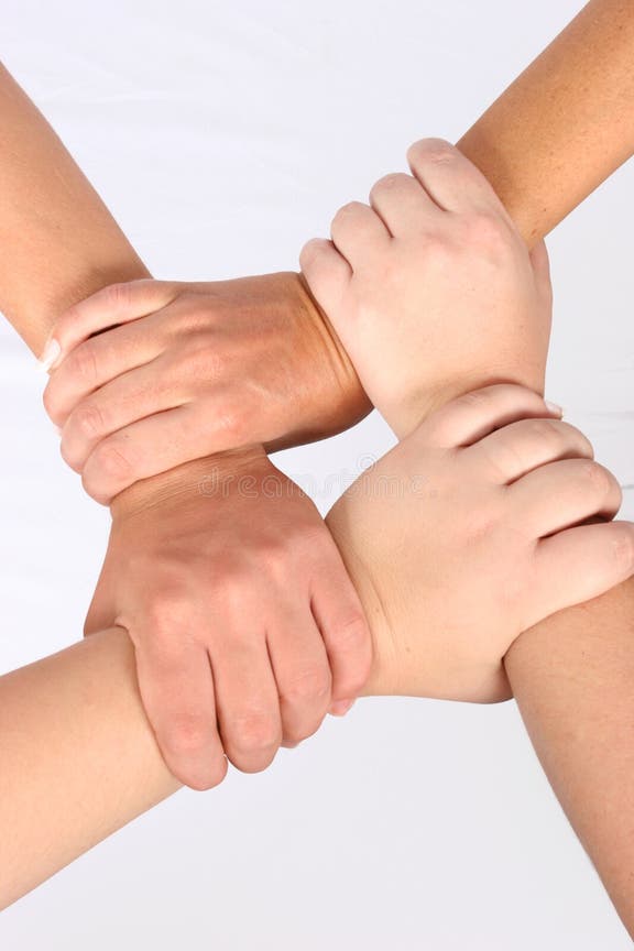 Interlocked hands stock photo. Image of hands, team, teamwork - 416756