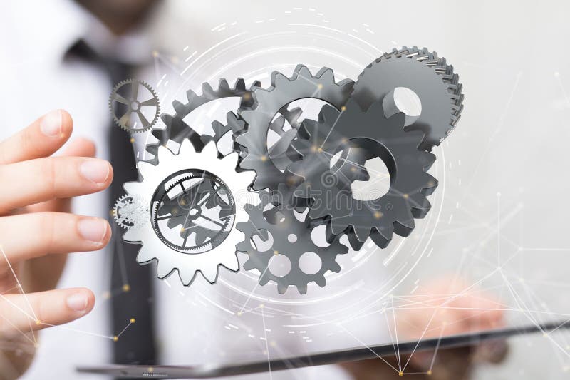 Interlocking Gears Against a Technology Background in Front of a Person ...