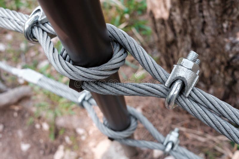 Interlocking Steel Cable Secures a Barrier on a Mountain Path Stock ...